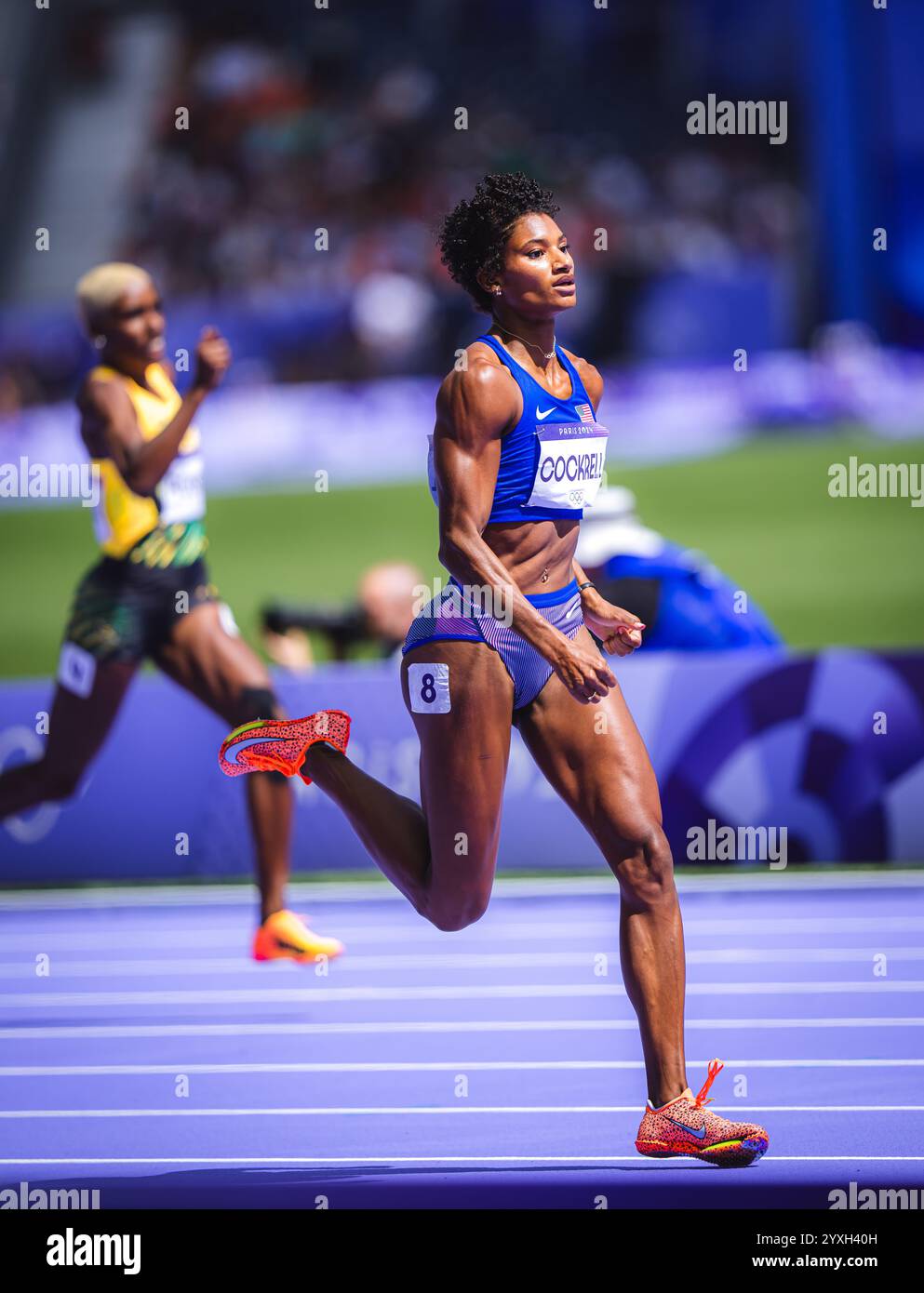 Anna Cockrell participating in the 400 meters hurdles at the Paris 2024 ...