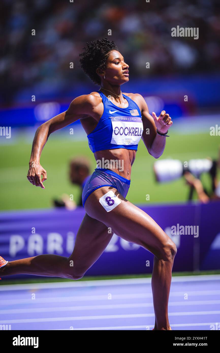 Anna Cockrell participating in the 400 meters hurdles at the Paris 2024 ...