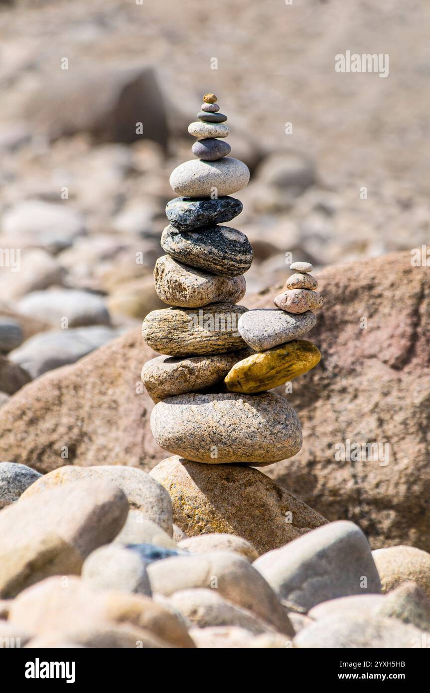 A cairn or rock pile on the shore. Concepts of peace, calm, grounding ...