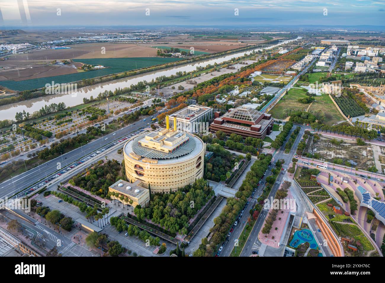 Torre Triana stands tall in Seville, with the Guadalquivir River and ...