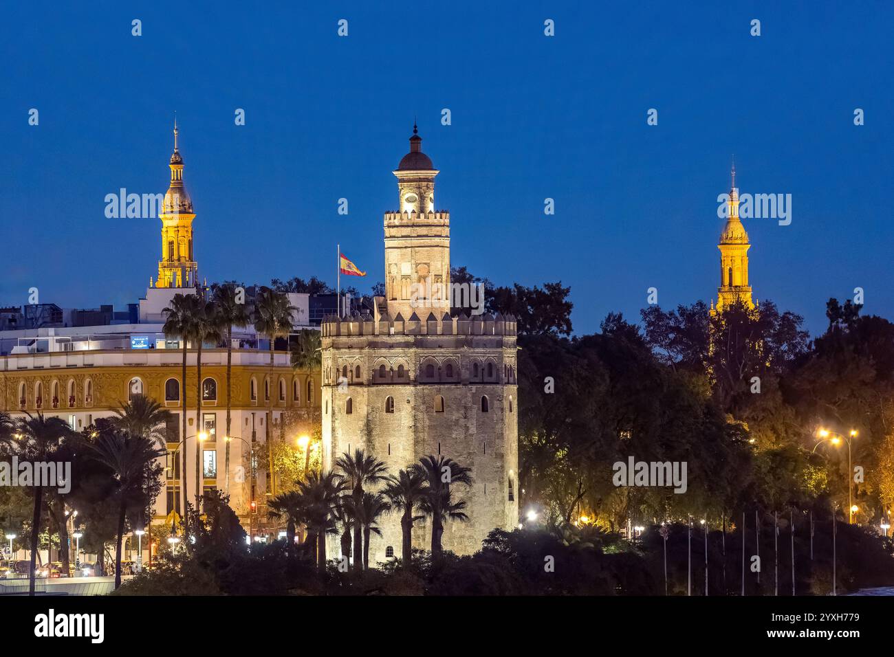 Night view of Seville landmarks including Torre del Oro and illuminated ...