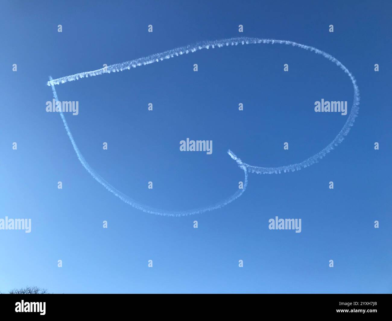 Heart made by airplane in the blue sky. Photo taken in Västerås Sweden ...