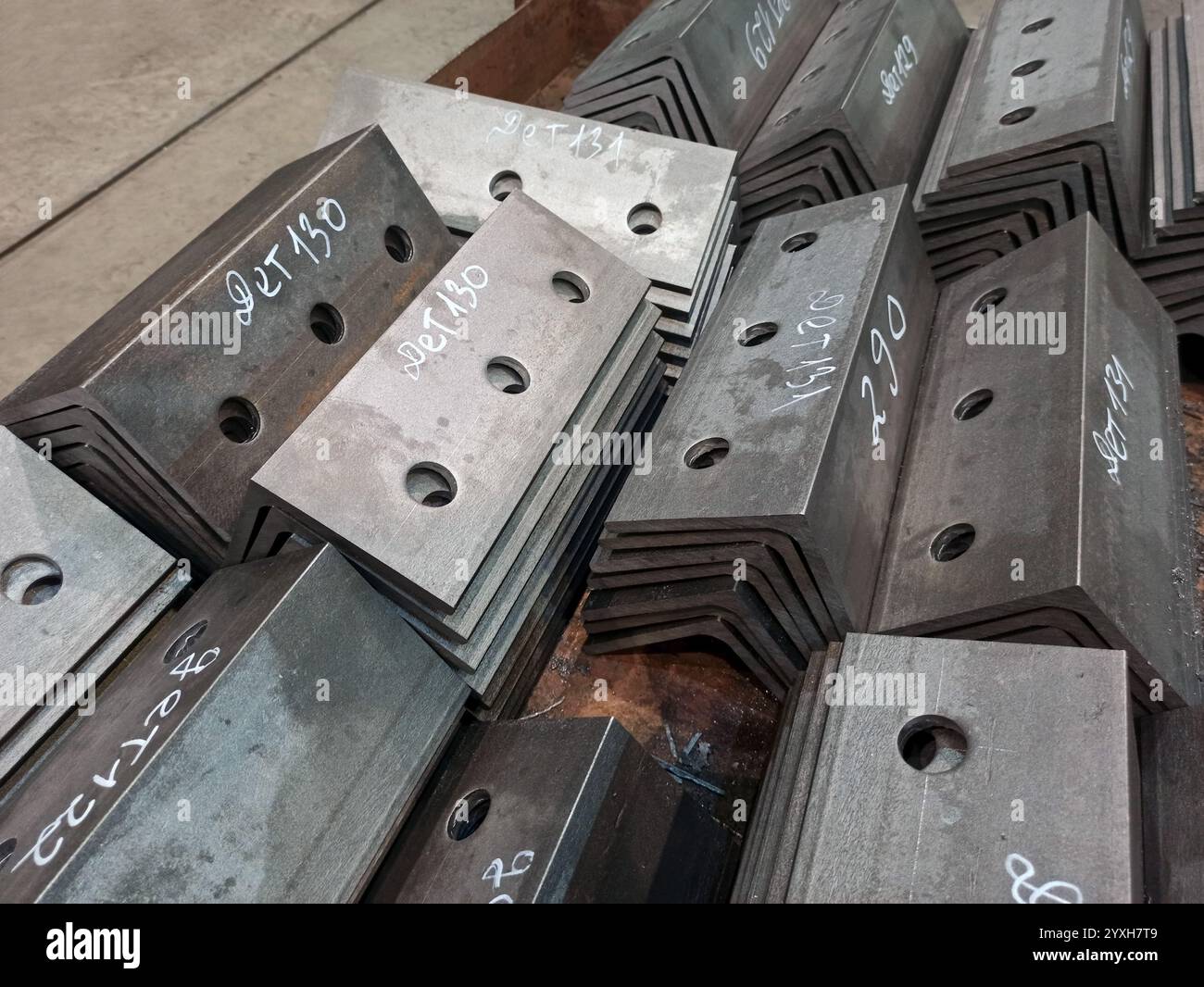 Metal cutting processing. Corner with holes. Warehouse of finished ...