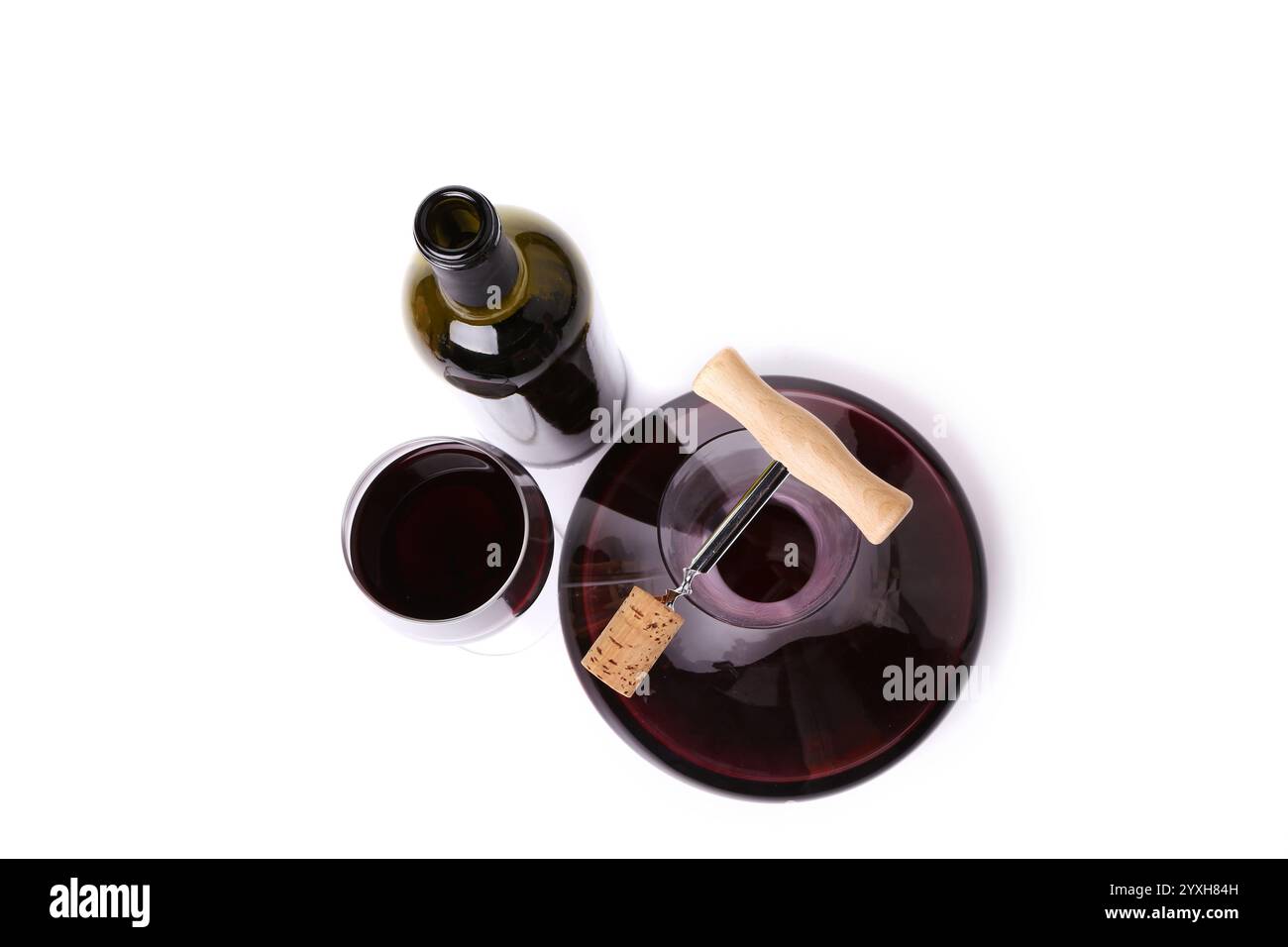 Decanter bottle and glass with red wine top view. White background ...