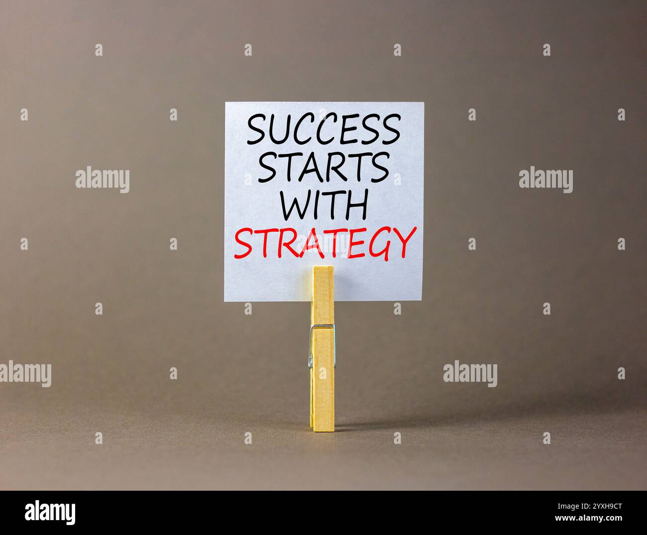 Success starts with strategy symbol. Concept words Success starts with ...