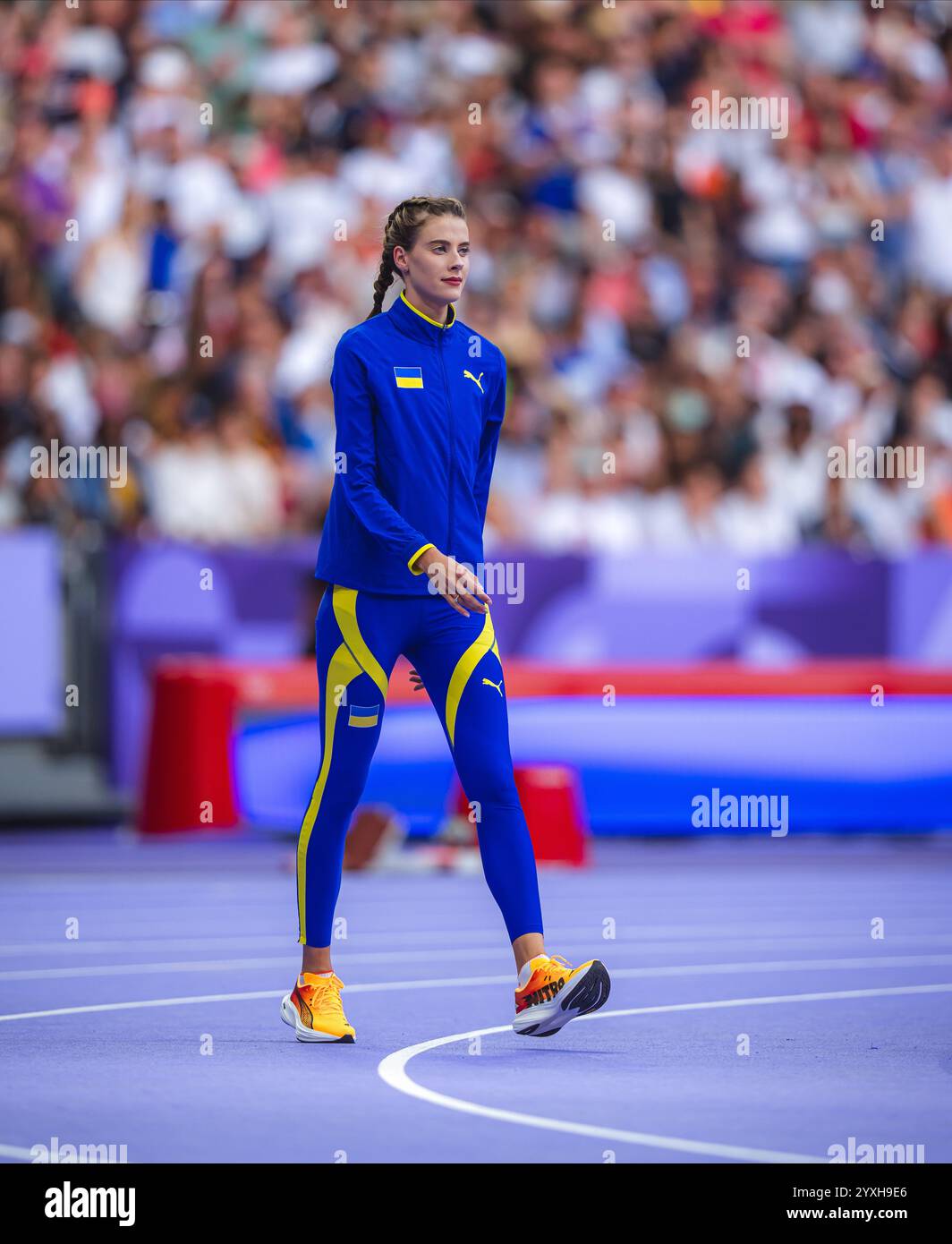 Yaroslava Mahuchikh participating in the high jump at the Paris 2024 ...