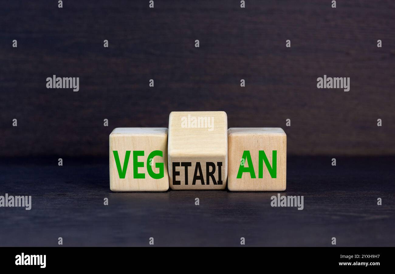 Vegetarian or vegan symbol. Concept words Vegetarian Vegan on wooden ...