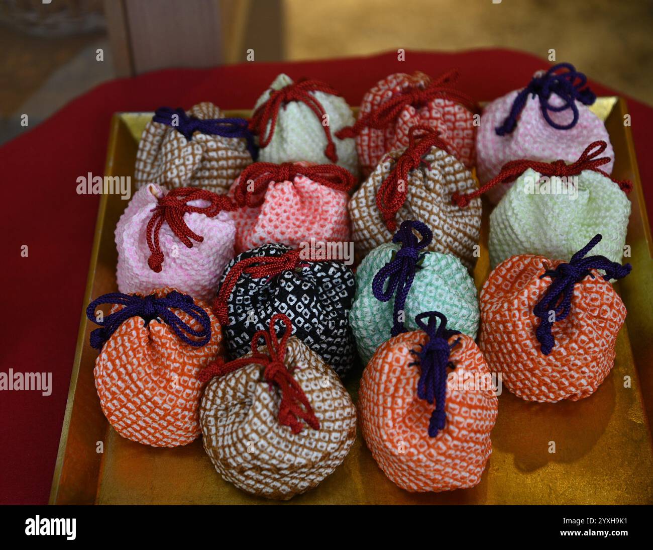Colorful handmade Japanese fabric drawstring gift pouches on display at ...
