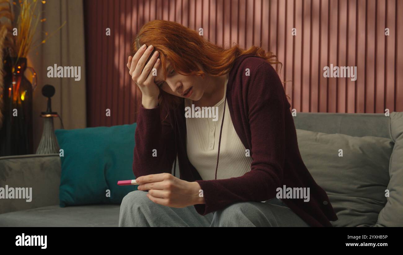Single pregnant Caucasian woman future mother at home scared stressed ...