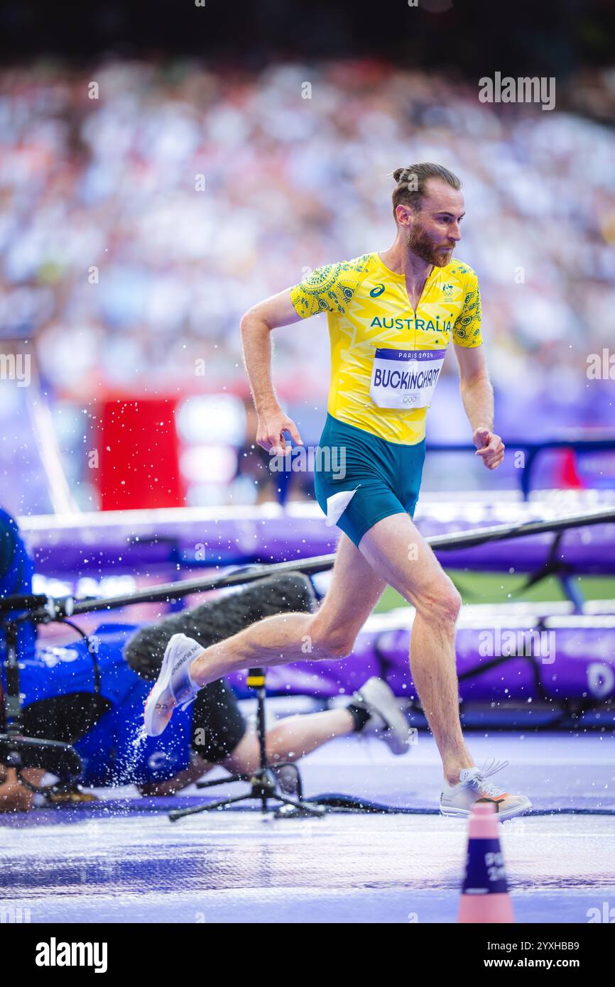 Ben Buckingham participating in the 3000 metres steeplechase at the ...