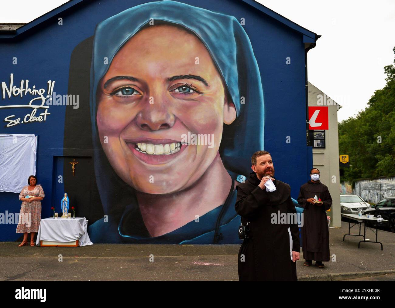 Father Stephen ODC addresses the attendance at the unveiling of a mural ...