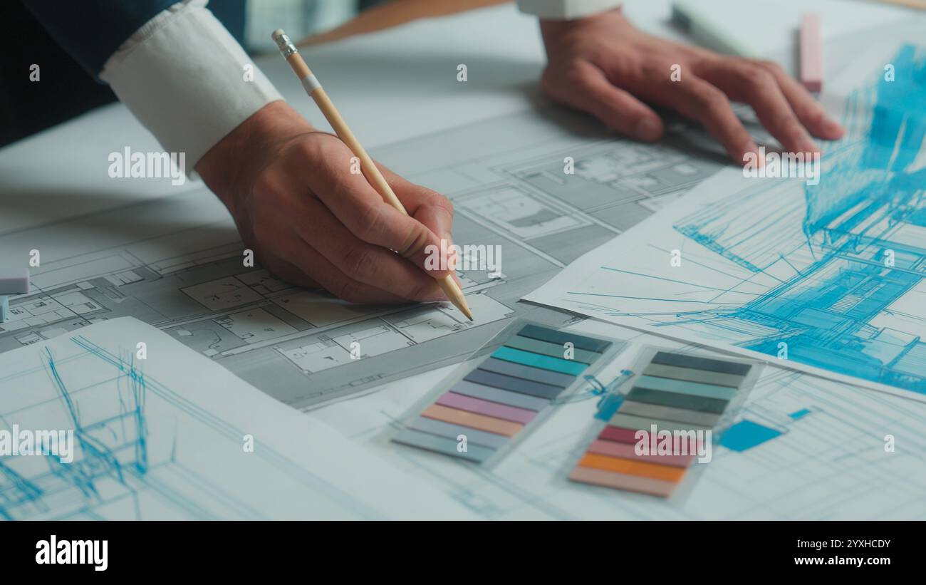 Group engineers architects discuss blueprint hi-res stock photography ...