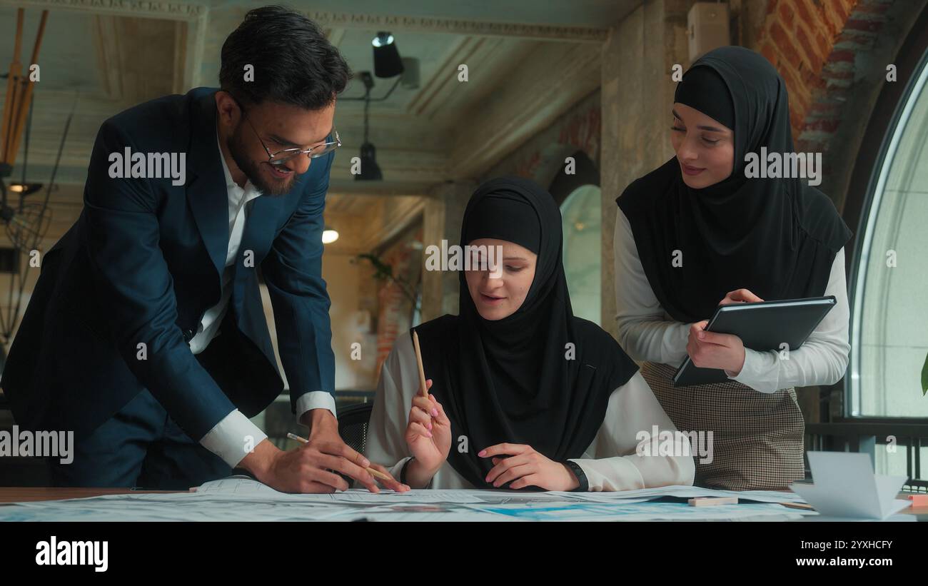 Arabian business man muslim women in hijab teamwork architecture ...