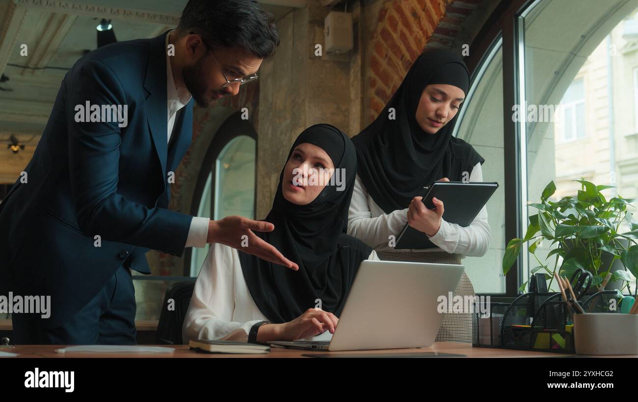 Multiethnic coworkers business women man teamwork collaboration Muslim ...