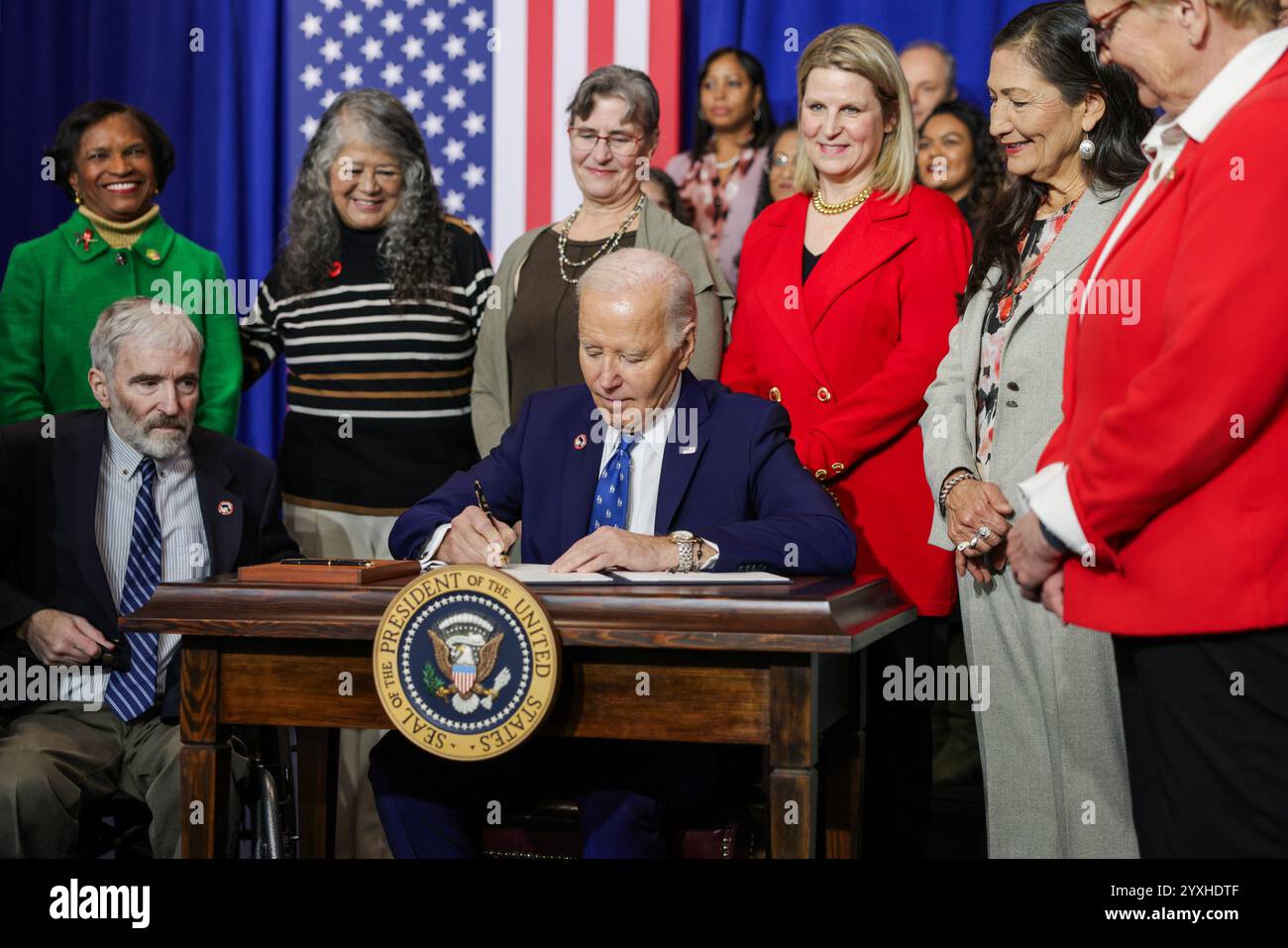 Washington, United States. 16th Dec, 2024. President Joe Biden signs a ...