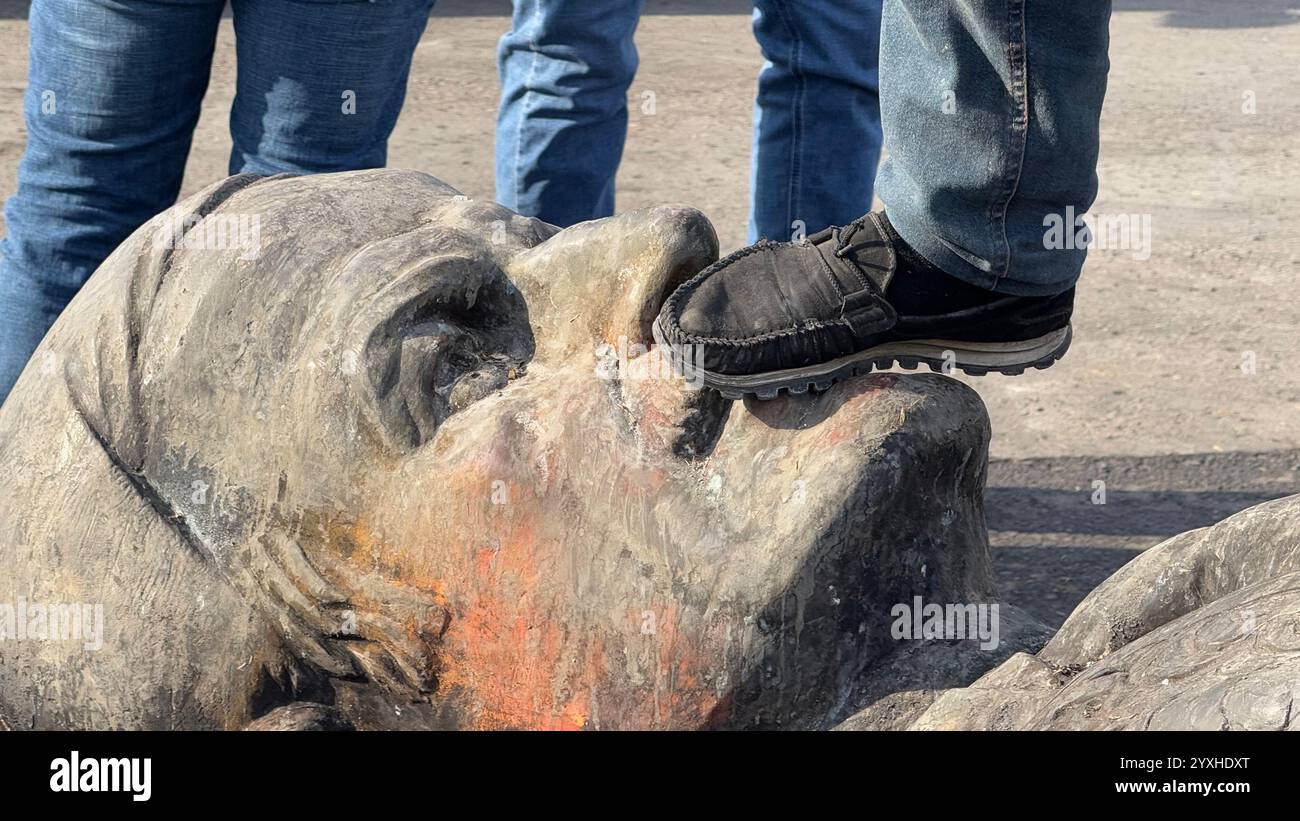 The demolished statue of Hafez al-Assad in the streets of Damascus ...