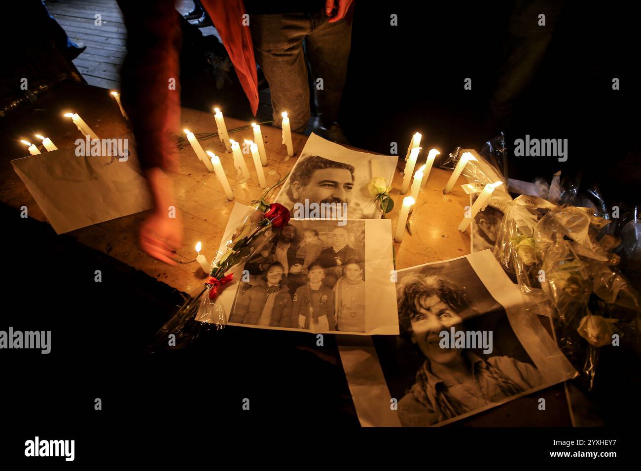 Beirut, Beirut, Lebanon. 16th Dec, 2024. Candles are lit near pictures ...