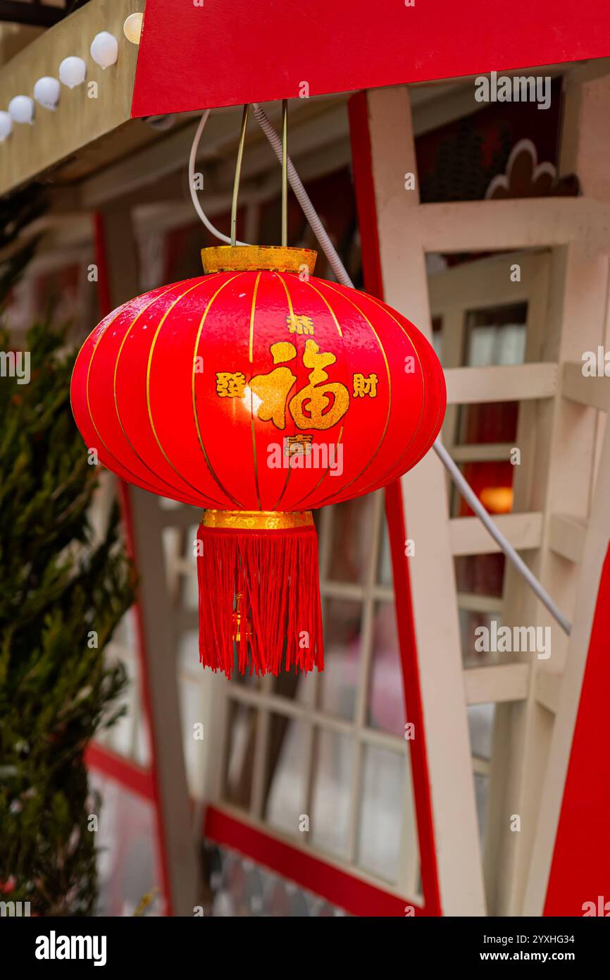 Bright red lantern hanging outside building, symbol prosperity of ...