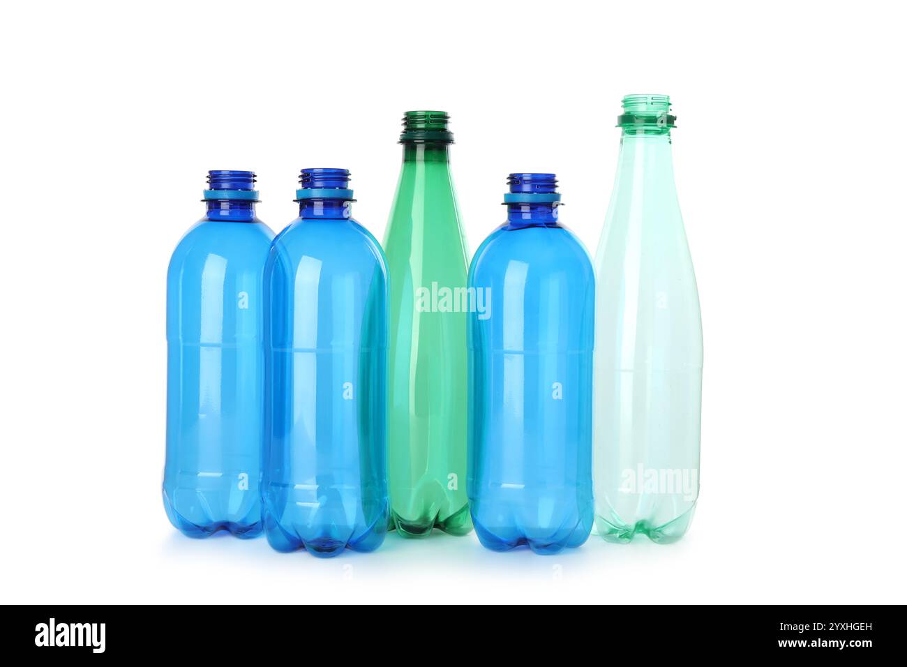 Many empty plastic bottles isolated on white Stock Photo - Alamy