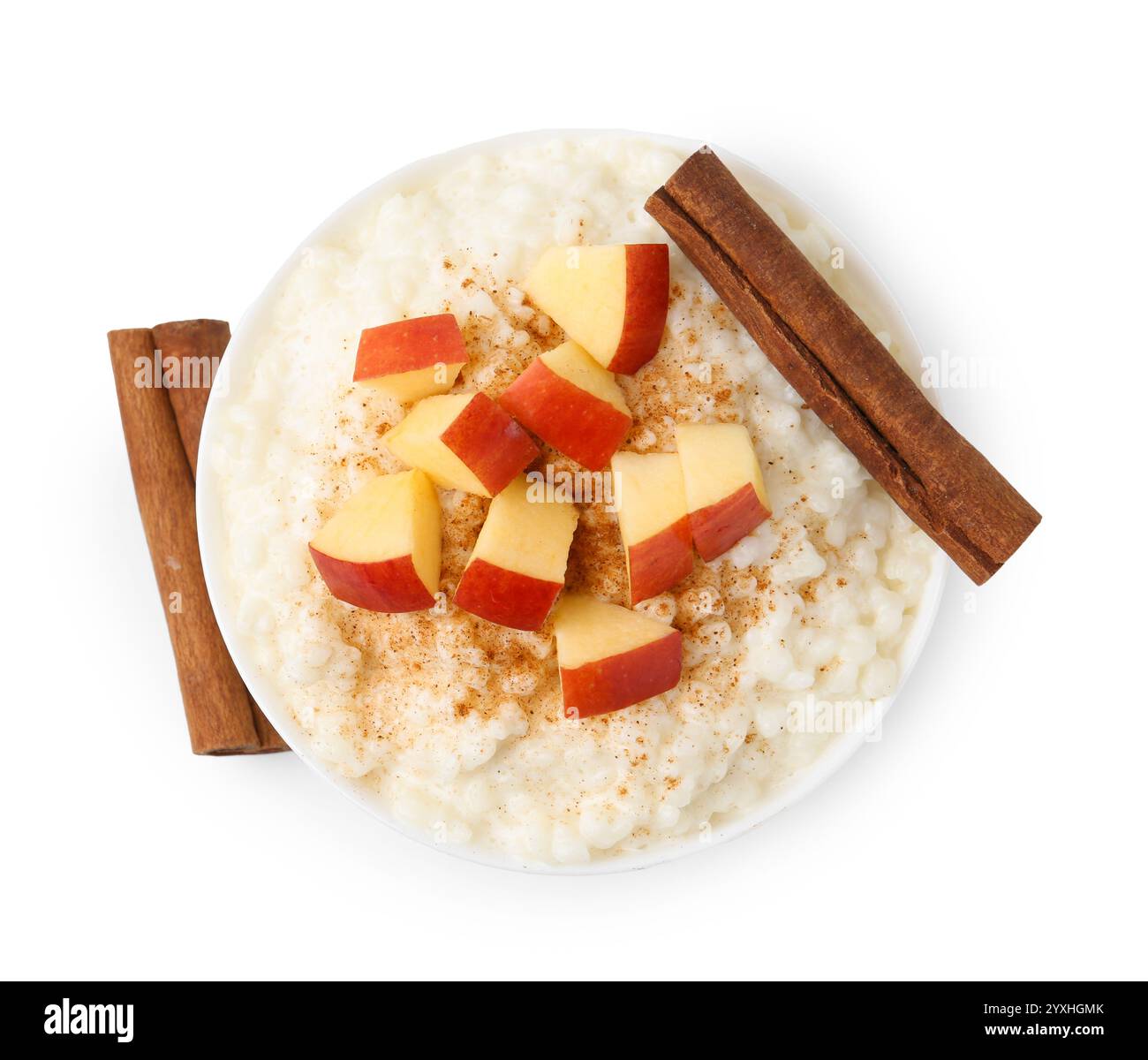 Delicious rice pudding with apples and cinnamon isolated on white, top ...