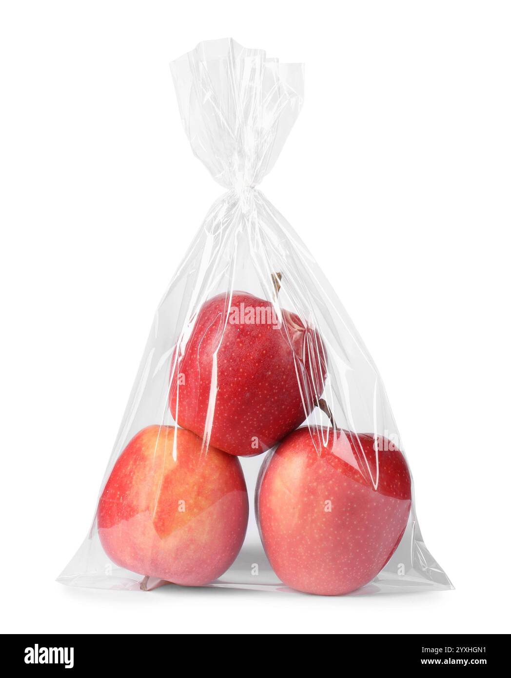 Plastic bag with red apples isolated on white Stock Photo - Alamy