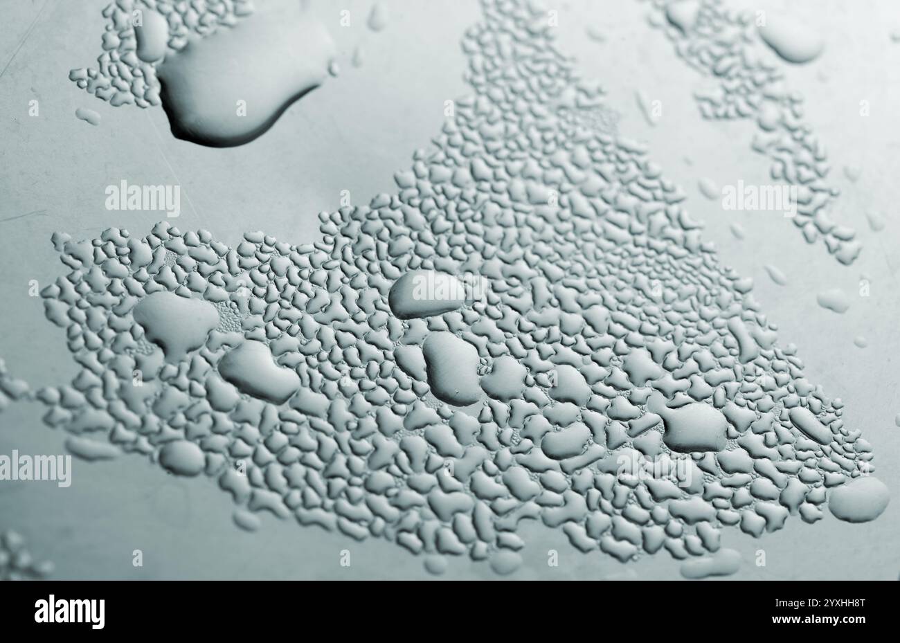 Macro background with water droplets condensation pattern on metal ...