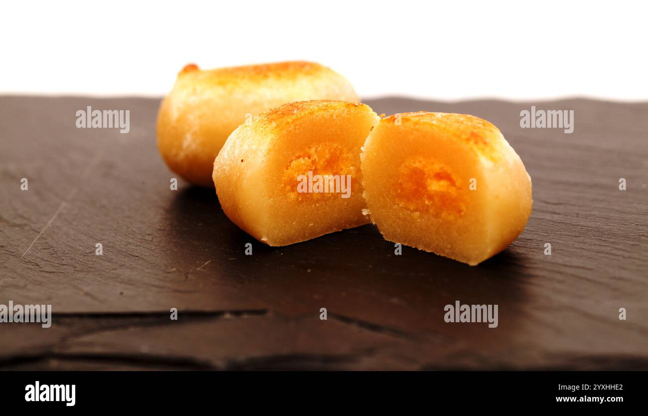 Pastel de yema, candied yolk covered in marzipan, one of many Spanish ...