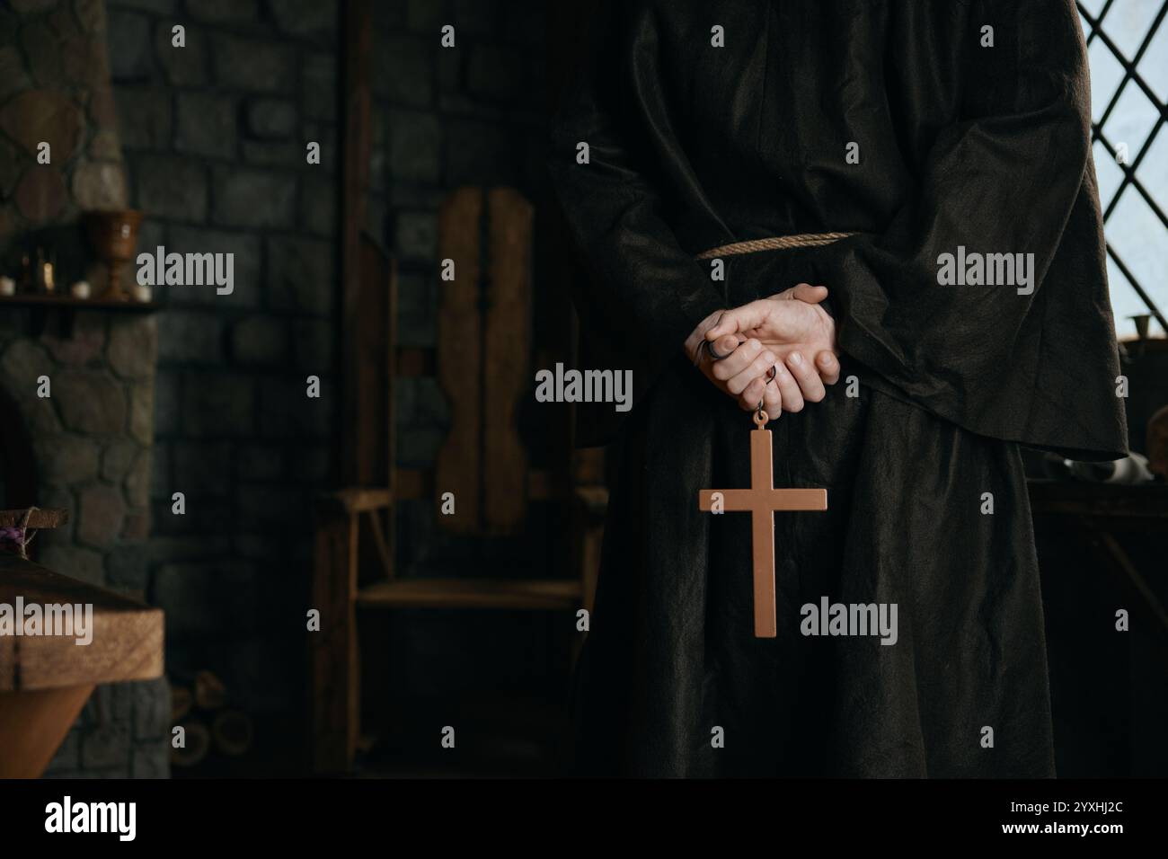 Closeup view cropped shot with golden cross in priest monk hands Stock ...