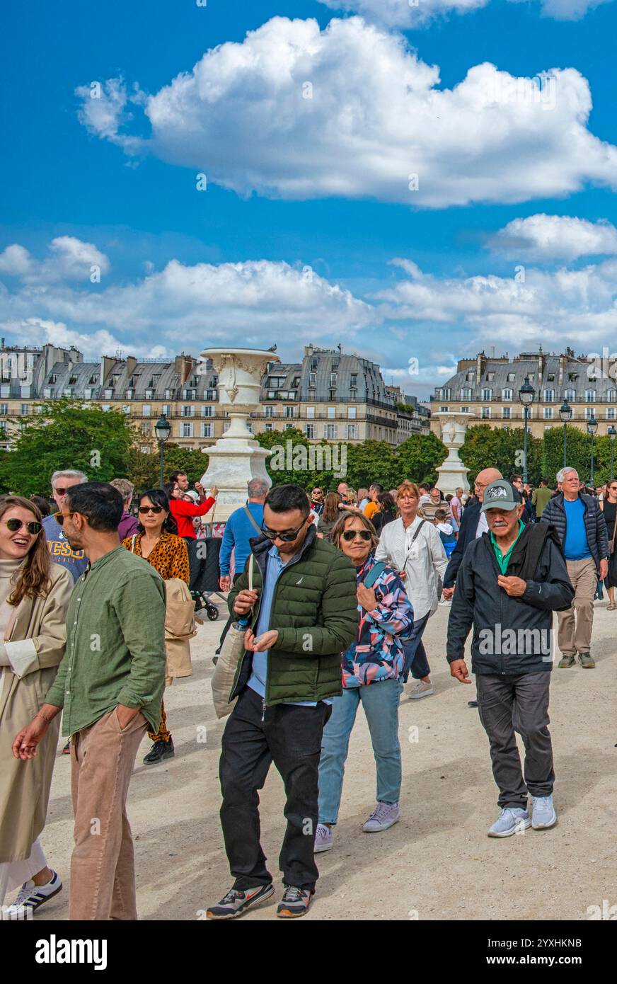 Hundreds of tourists at the Louvre in Paris, France, the new modern day ...