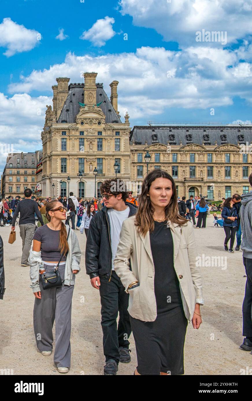 Hundreds of tourists at the Louvre in Paris, France, the new modern day ...