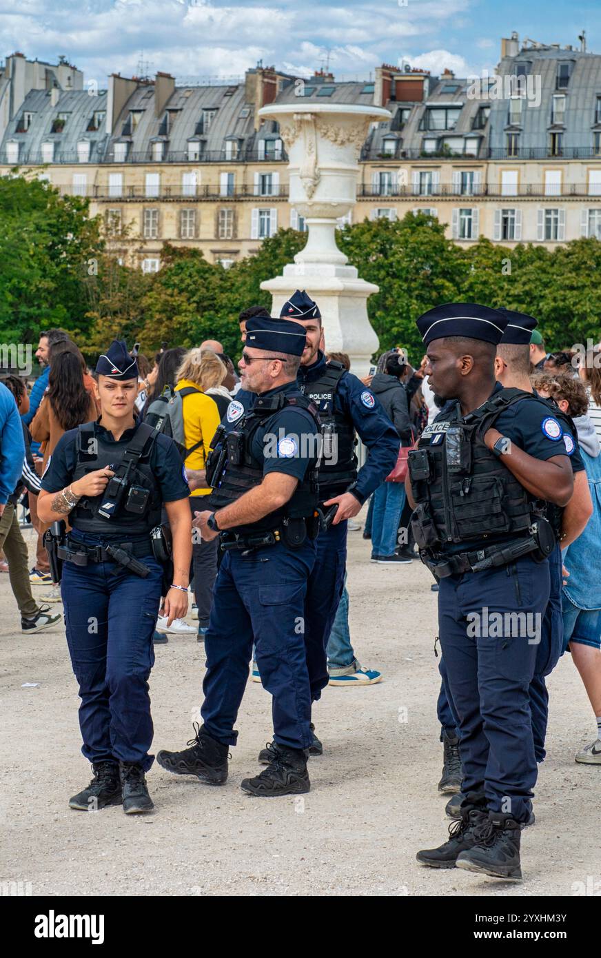 French Police officers mingle with the hundreds of tourists at the ...