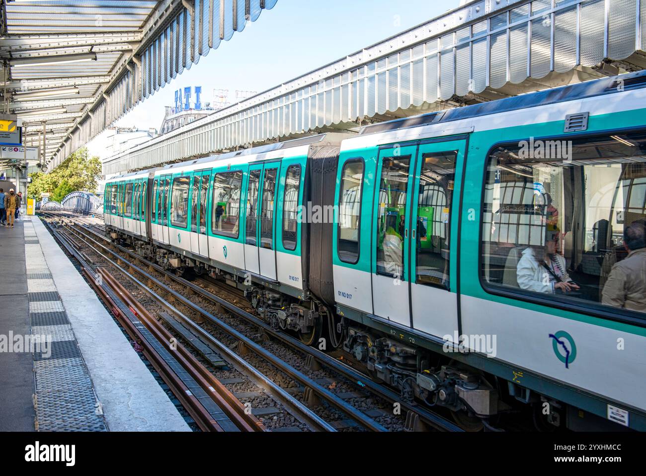 On the platform at the Barbes-Rochechouart Metro Station in Paris ...