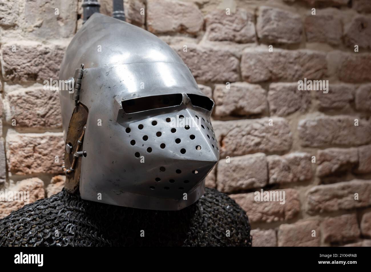 Medieval knight in a closed helmet portrait, detailed face closeup of ...