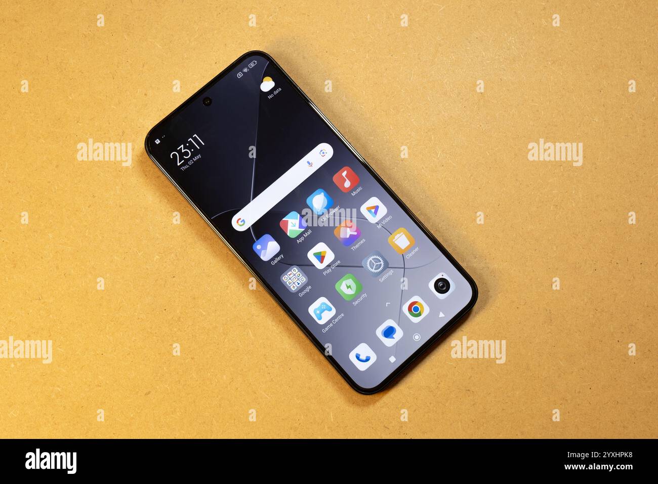 Modern Xiaomi Android smartphone lying on the table, top view of ...