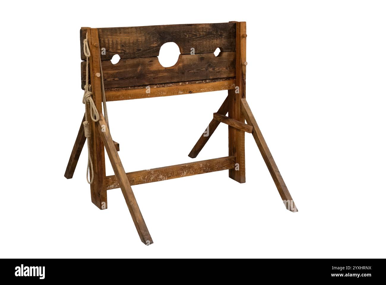 Wooden medieval stocks isolated on white background, antique punishment ...