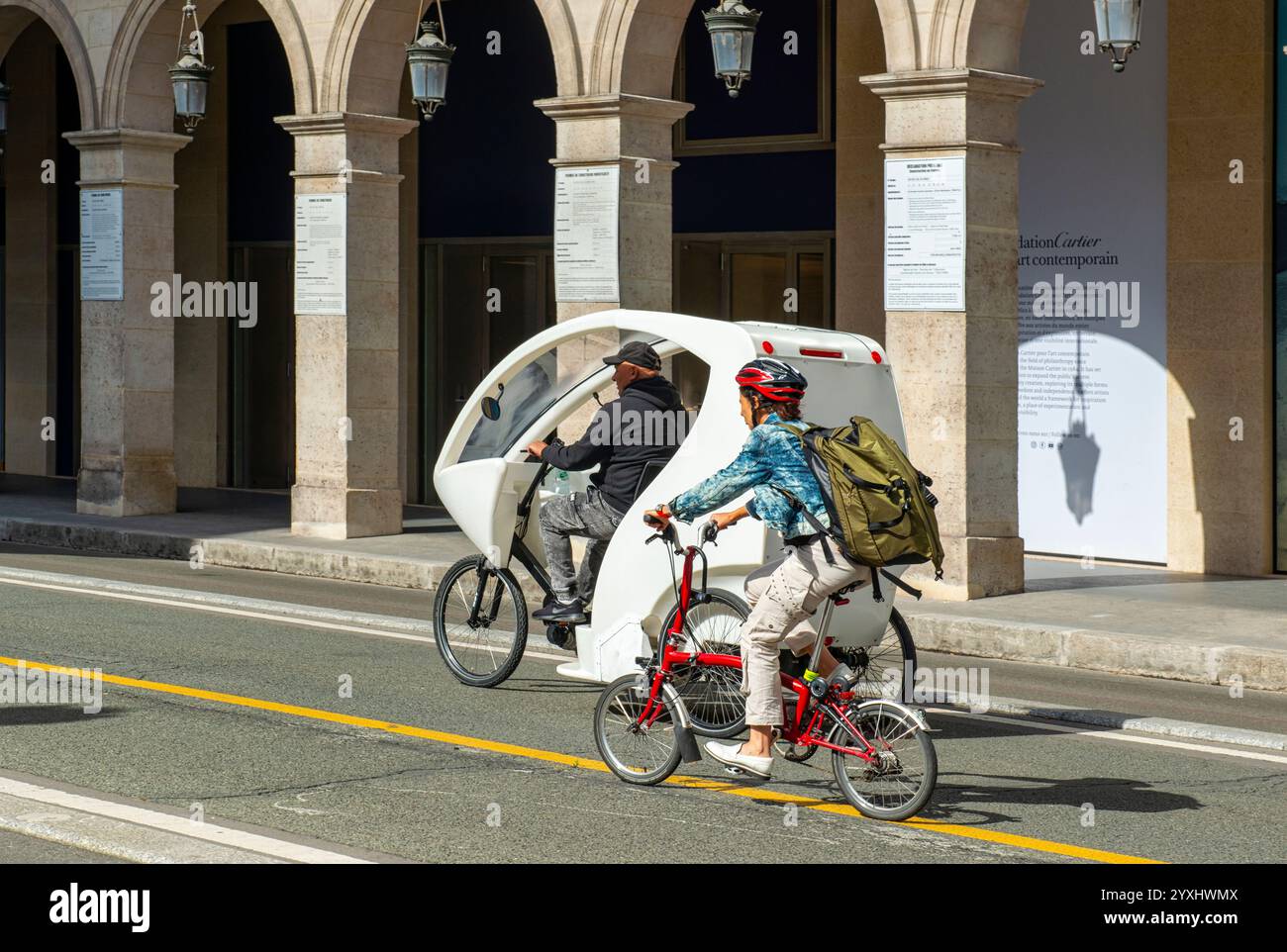 People using different modes of transport in Paris, here: Pedal Power ...