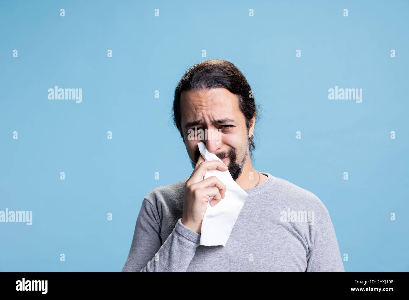 Sad melancholic person with anxiety crying and whining on camera ...