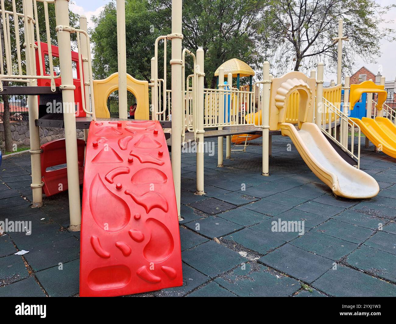 Slide playground rain hi-res stock photography and images - Alamy