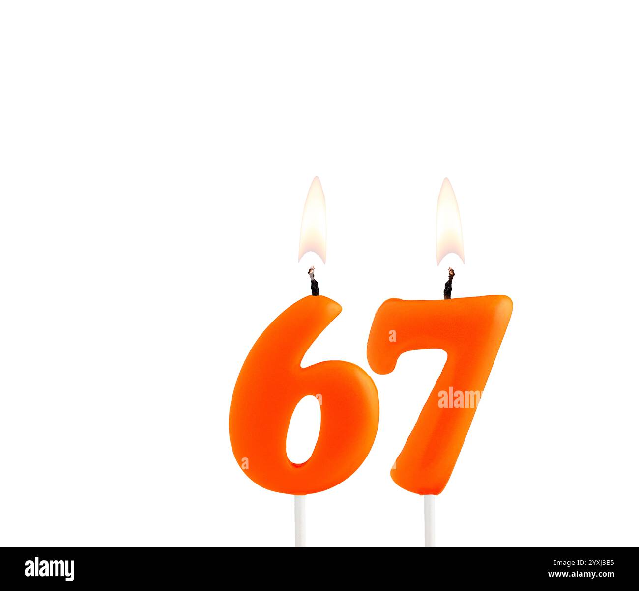 Lit birthday candle - Candle number 67 on white background Stock Photo ...
