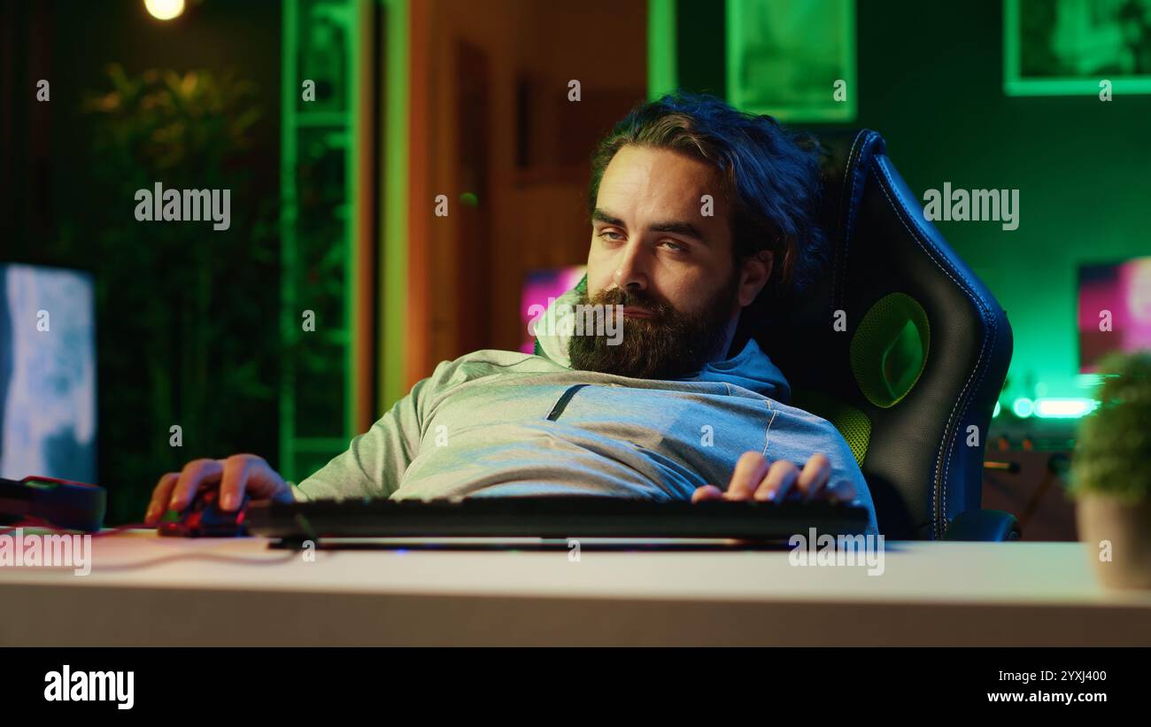 Gamer having seizure while at computer desk, exhausted after ...