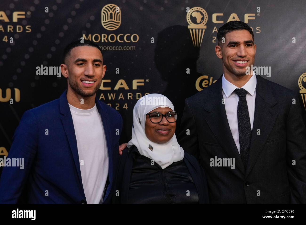 Morocco's Achraf Hakimi, right, arrives to attend the 2024 CAF Awards ...
