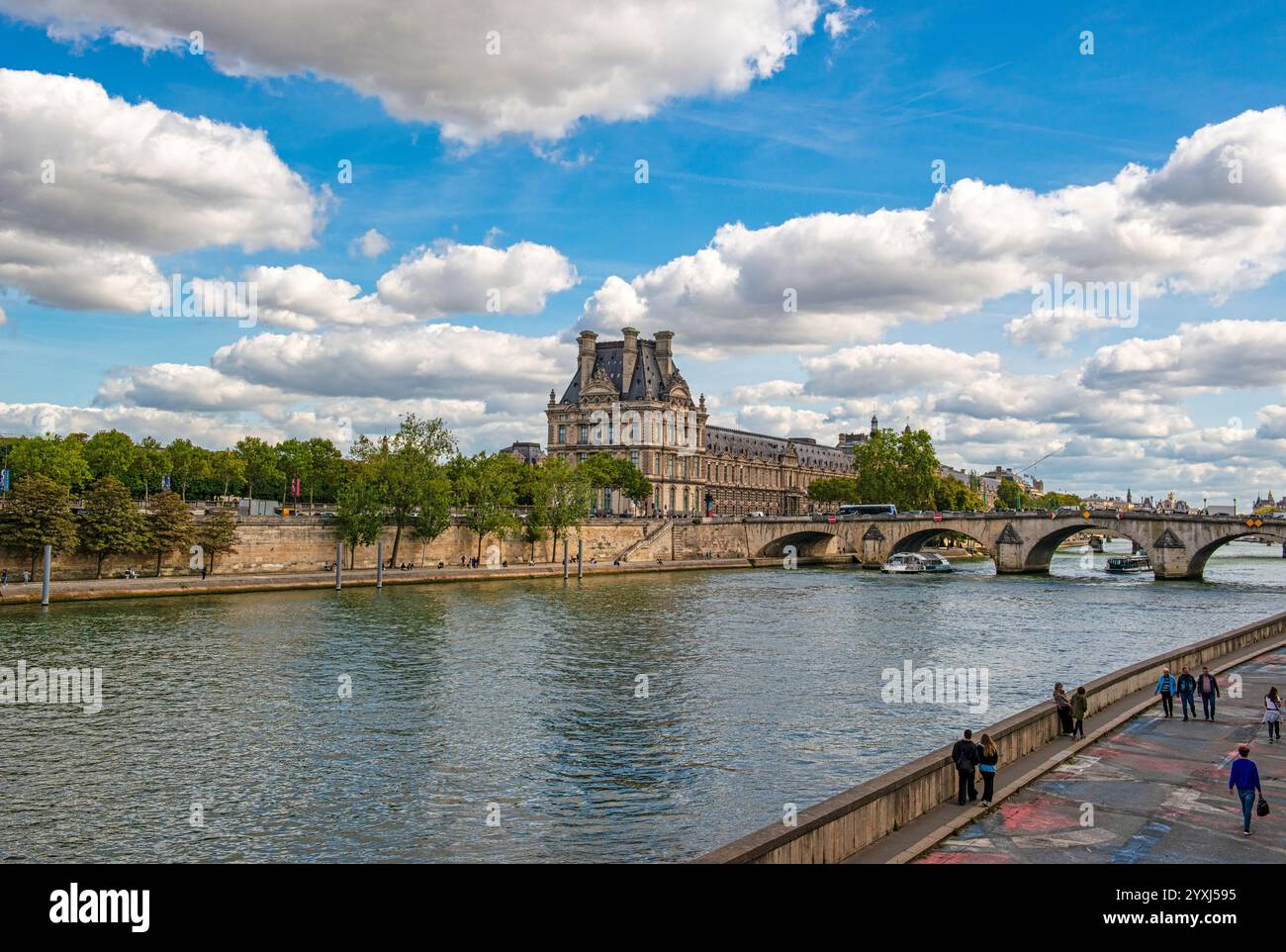 The Musee du Louvre on the North bank of the River Seine with the ...