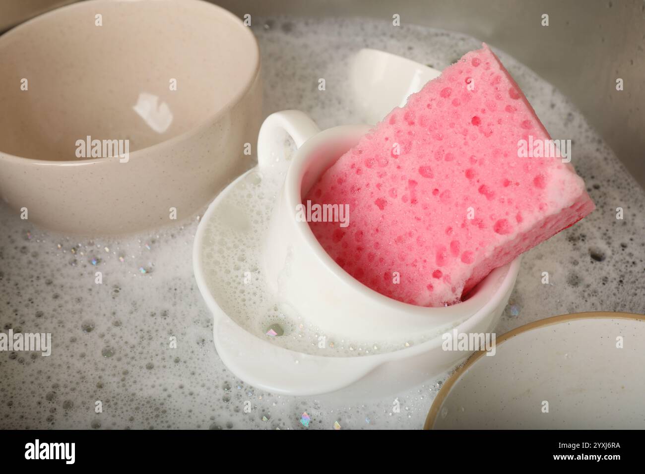 Cleaning sponge dishes foam hi-res stock photography and images - Alamy