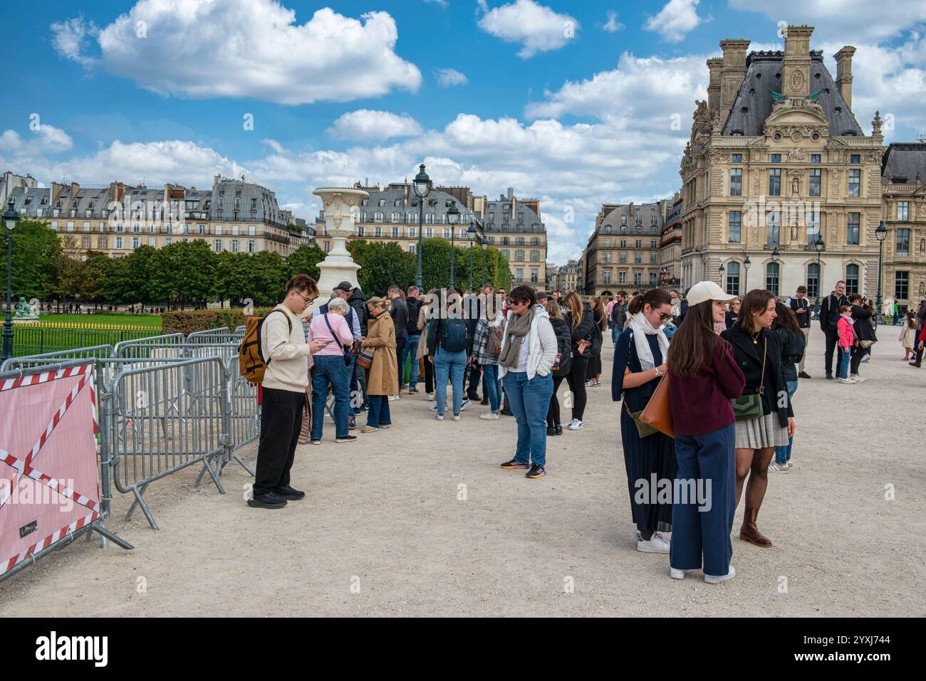 Hundreds of tourists at the Louvre in Paris, France, the new modern day ...