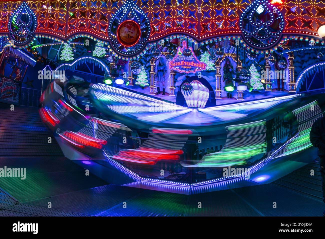 Bremen Germany, December 4, 2024: Long exposure of a fast amusement ...