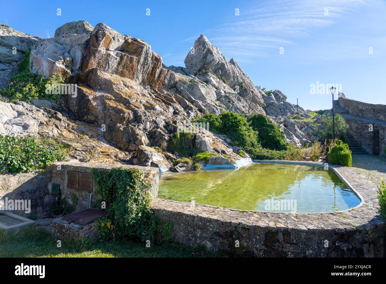 Interior of Marvãoo castle with artificial lake and rock formations ...