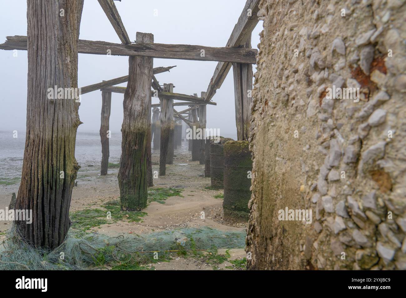 View of remains of wooden bridge destroyed only with stakes in the ...