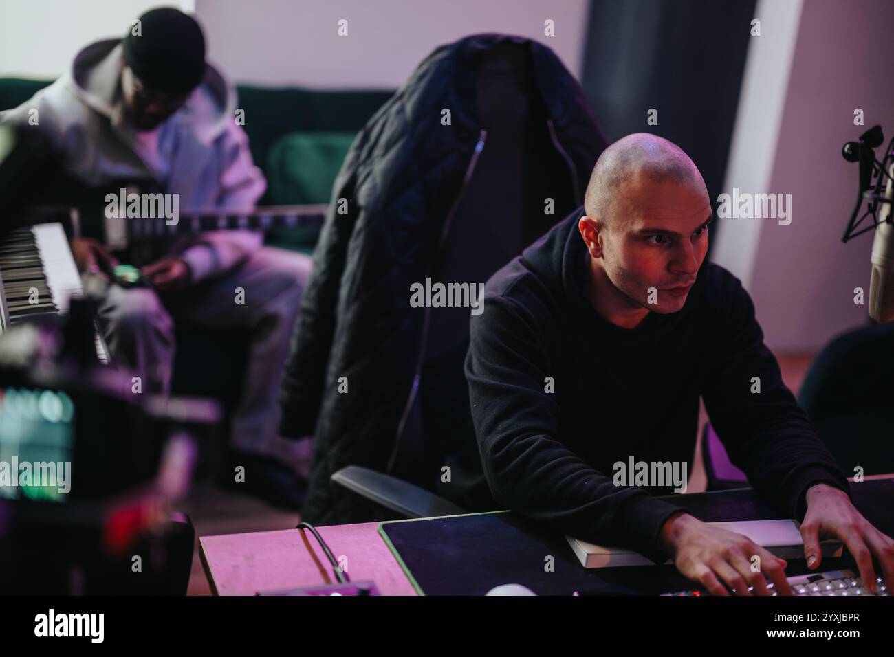 Creative music production session in a modern recording studio ...