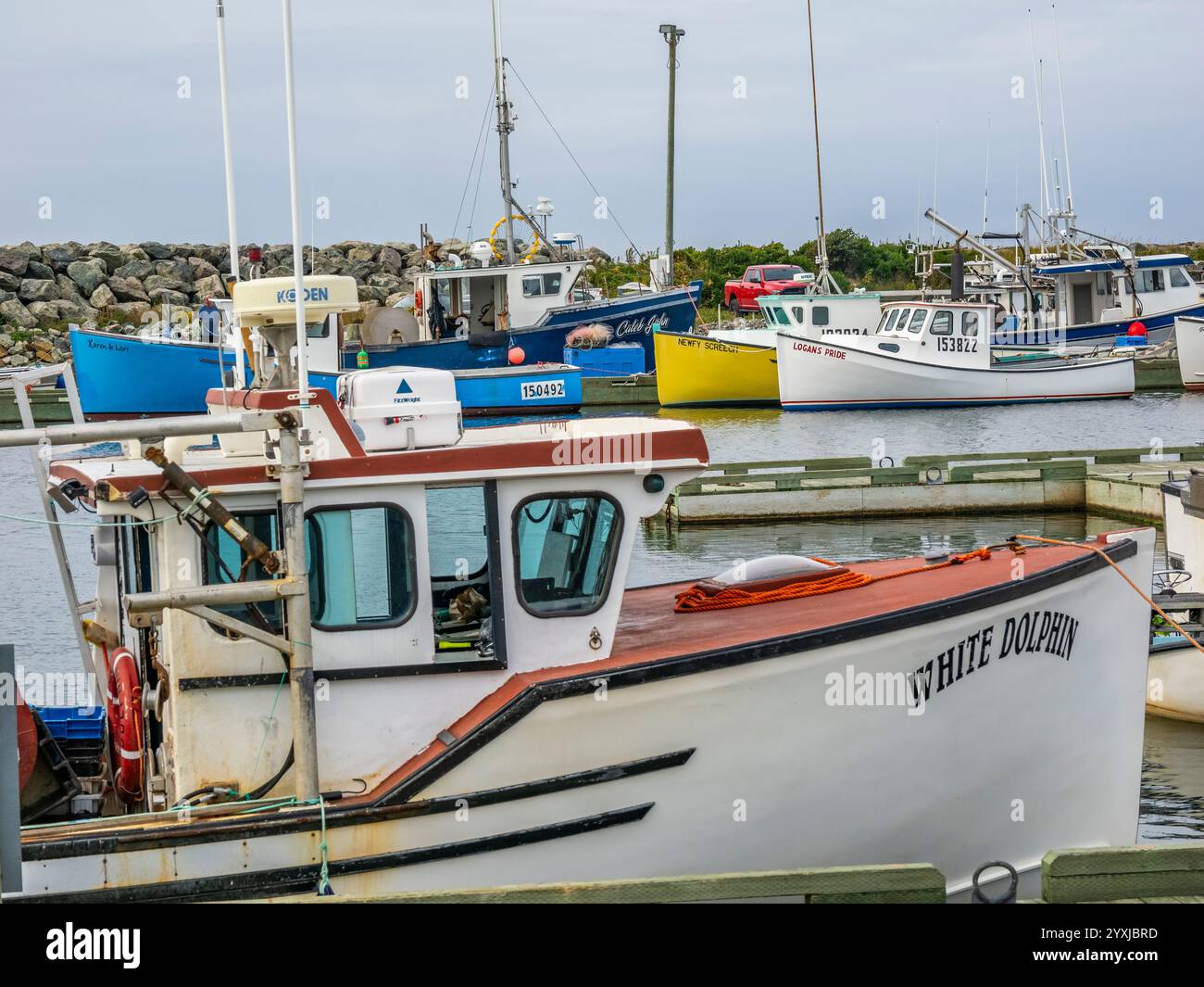 Fishing boats in Murphys Pond Harbour on the Cabot Trail on Cape Breton ...