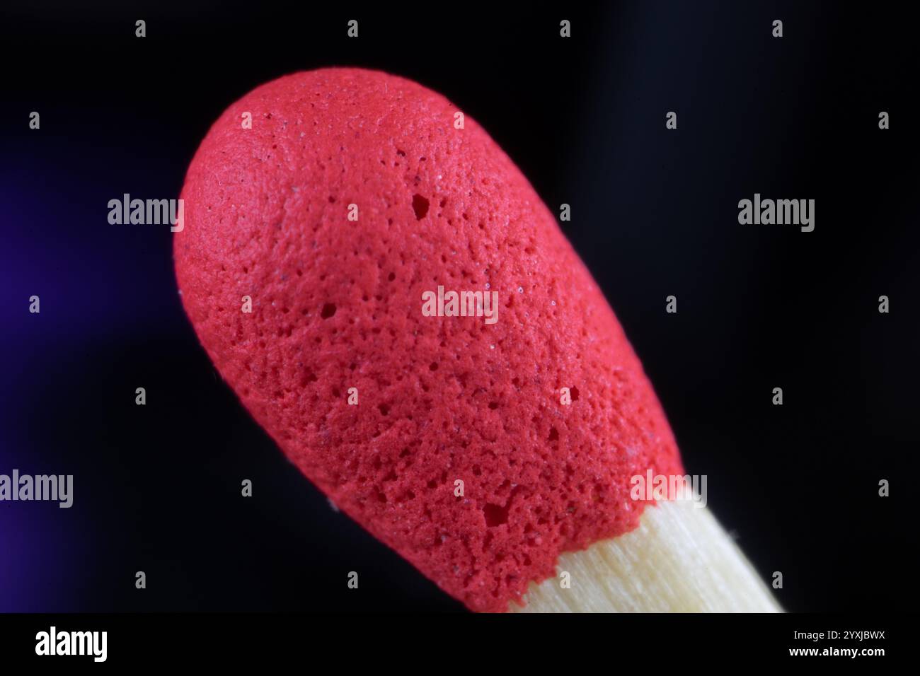 Macrophotography of phosphorus head made of flammable red material ...